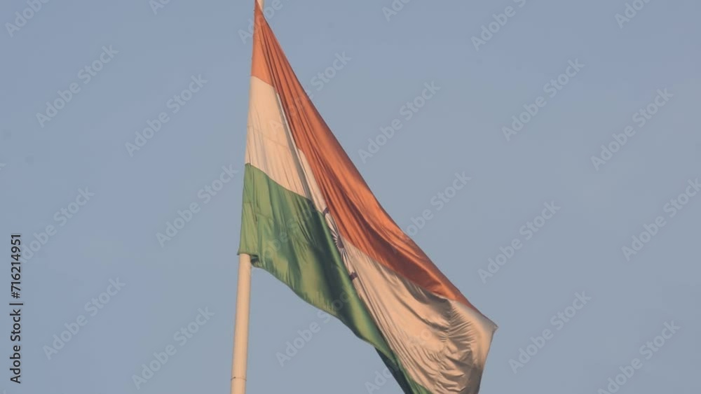 India flag flying high at Connaught Place with pride in blue sky, India ...