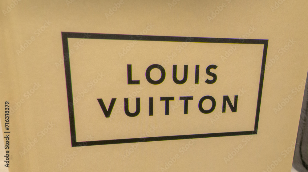 louis vuitton chain logo and sign text facade entrance store fashion ...