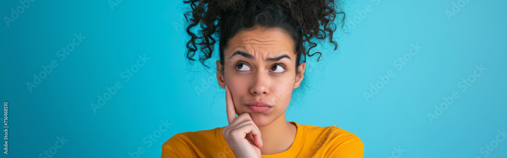 Website and advertisement header with curly girl with doubtful and ...