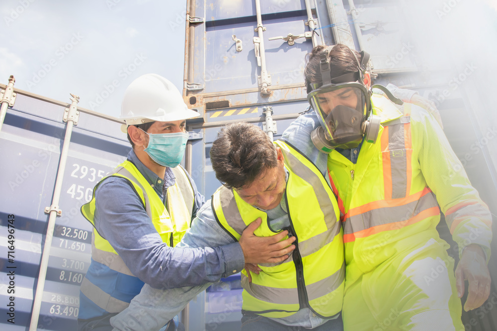 Team male rescue workers PPE uniforms wearing gas mask protect against ...