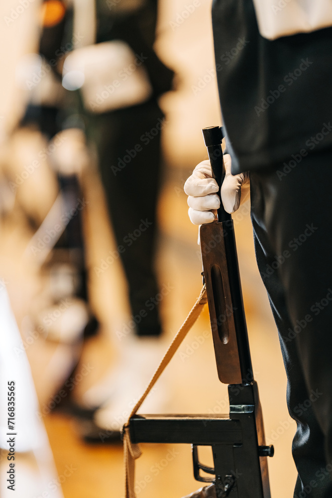 a mannequin of a man holding a gun. building fake people with a fake ...