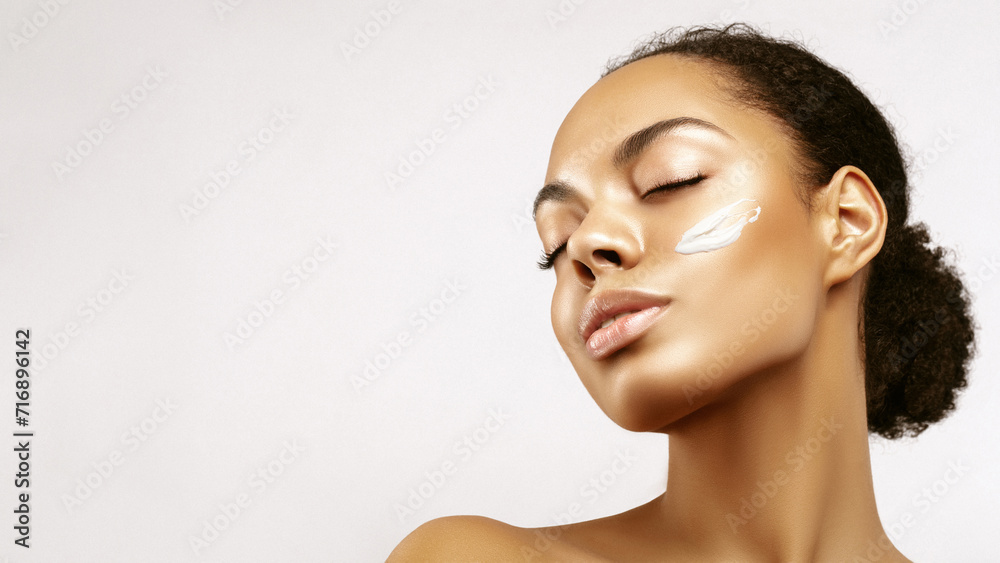 African American skincare model portrait with a glowing hydrated skin ...