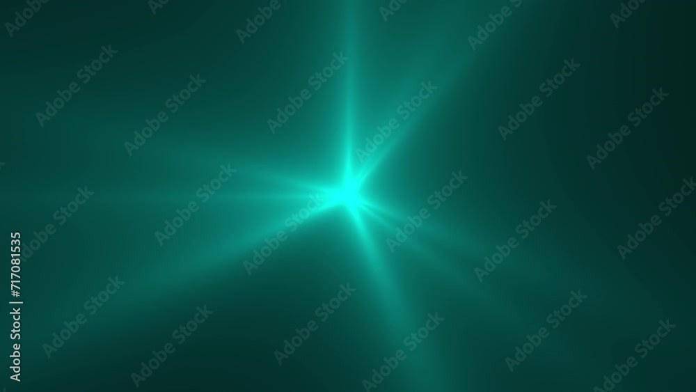 Looped animation of spot teal lights glow rays lights optical lens ...
