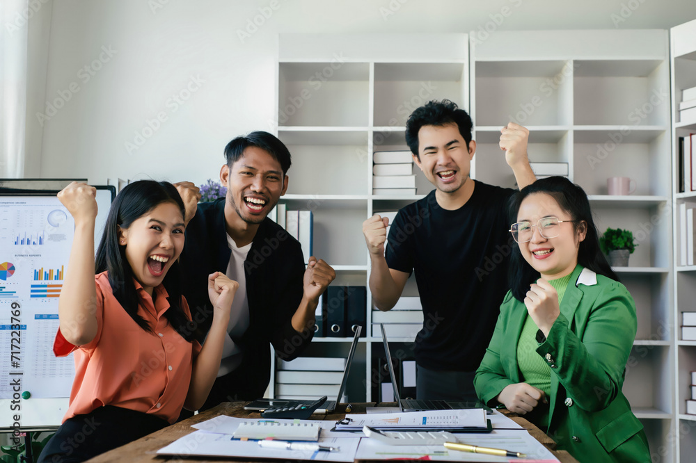 Happy diverse business team celebrating success and having fun all together, Celebration in the ...