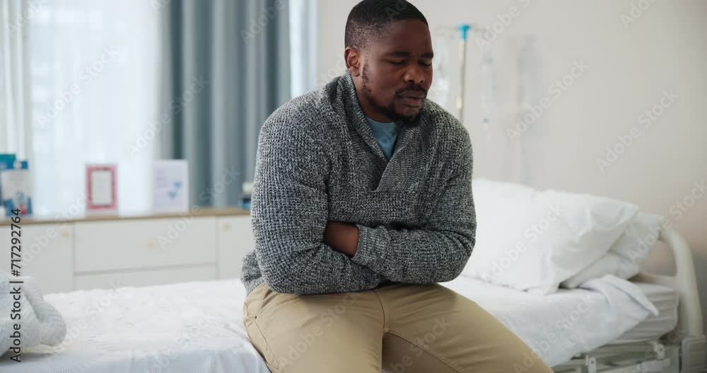 Healthcare, pain and black man patient with stomach ache on hospital ...