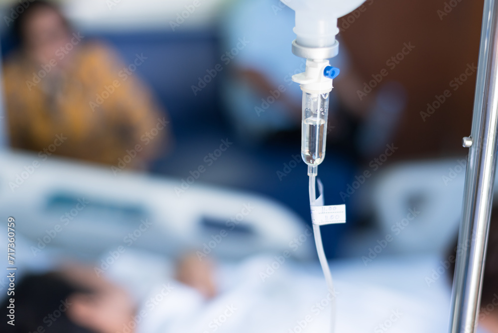 Close up set iv fluid intravenous drop saline drip in hospital room ...