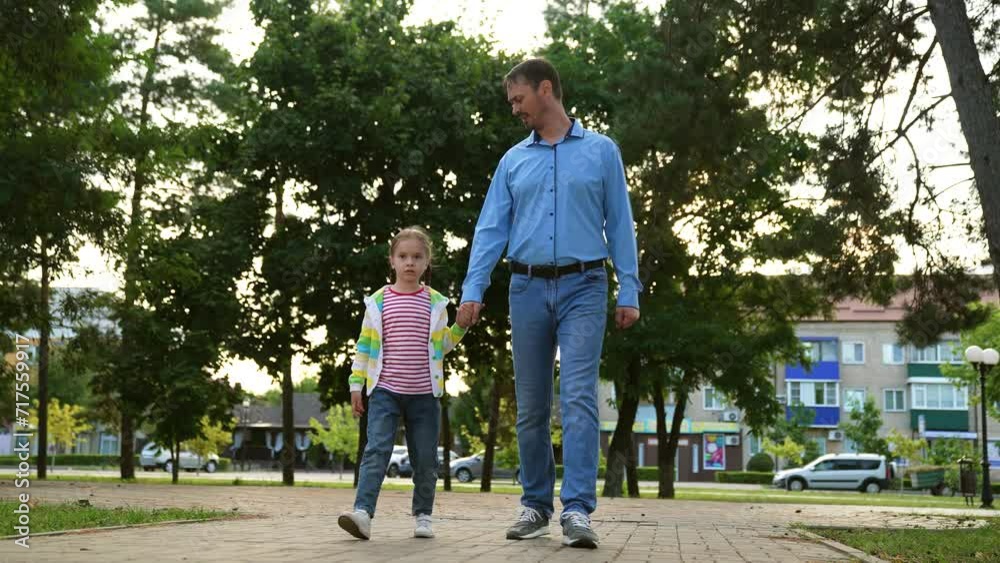 loving father walks with little child city park, family walk, happy ...