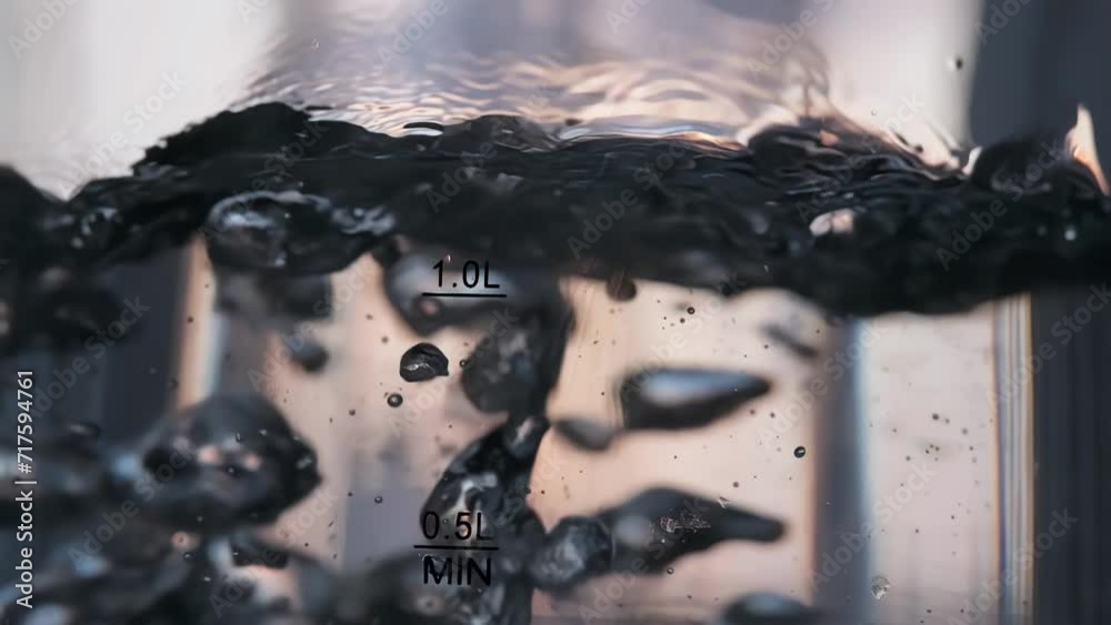 boiling water, boiling water, boiling water in a transparent container ...