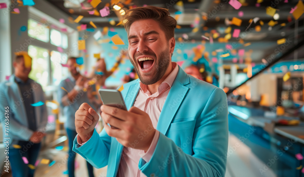 Ecstatic Man Celebrating with Smartphone and Confetti. Joyful man in a ...