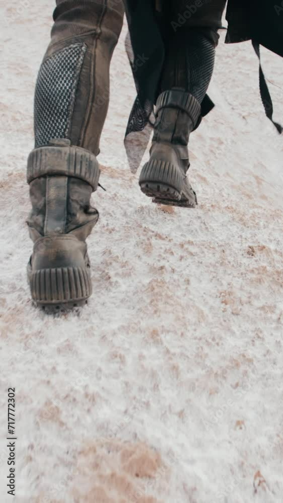Vertical close-up back view following female legs stepping. Post ...