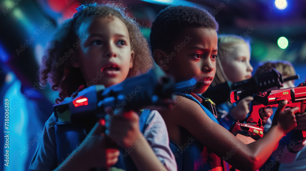 cheerful children playing laser tag, kids, shooting, laser gun, game ...