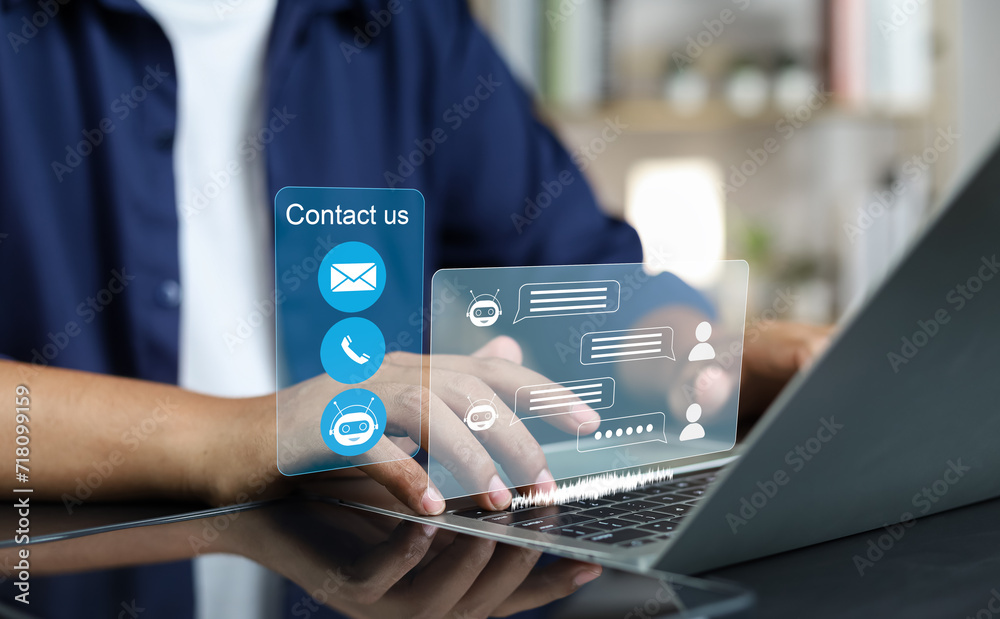 Businessman using AI chatbot conversation assistant in app on device ...