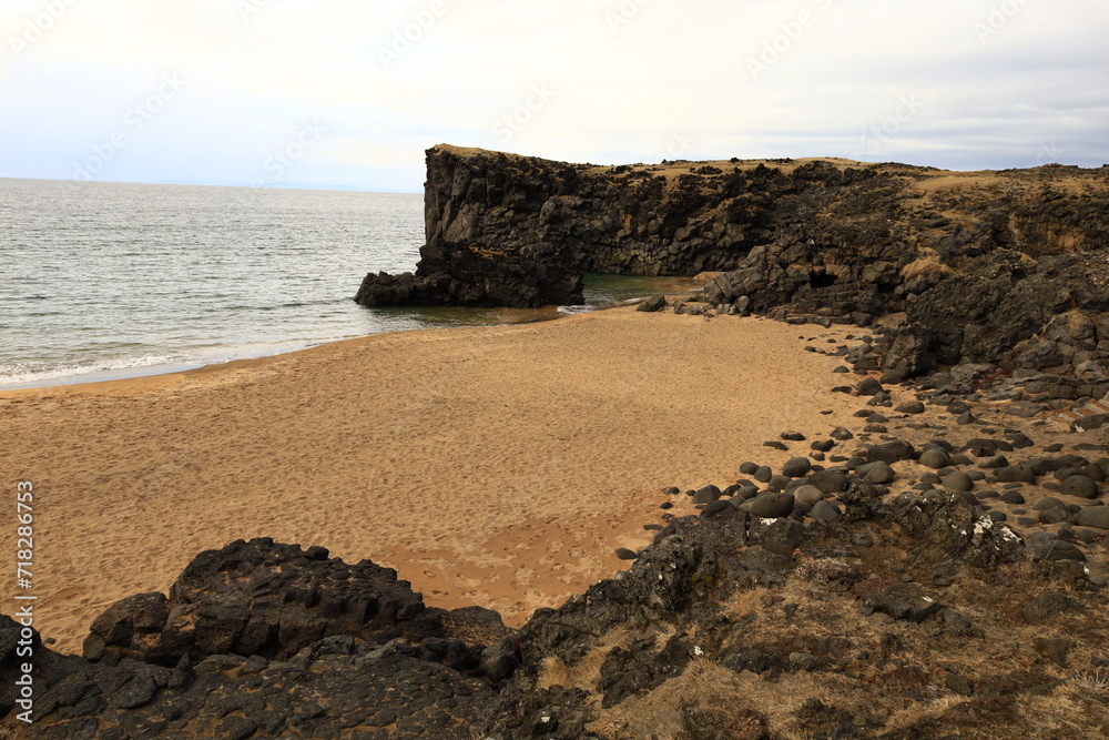 Skarðsvík is a tiny and charming beach with huge basaltic rock ...