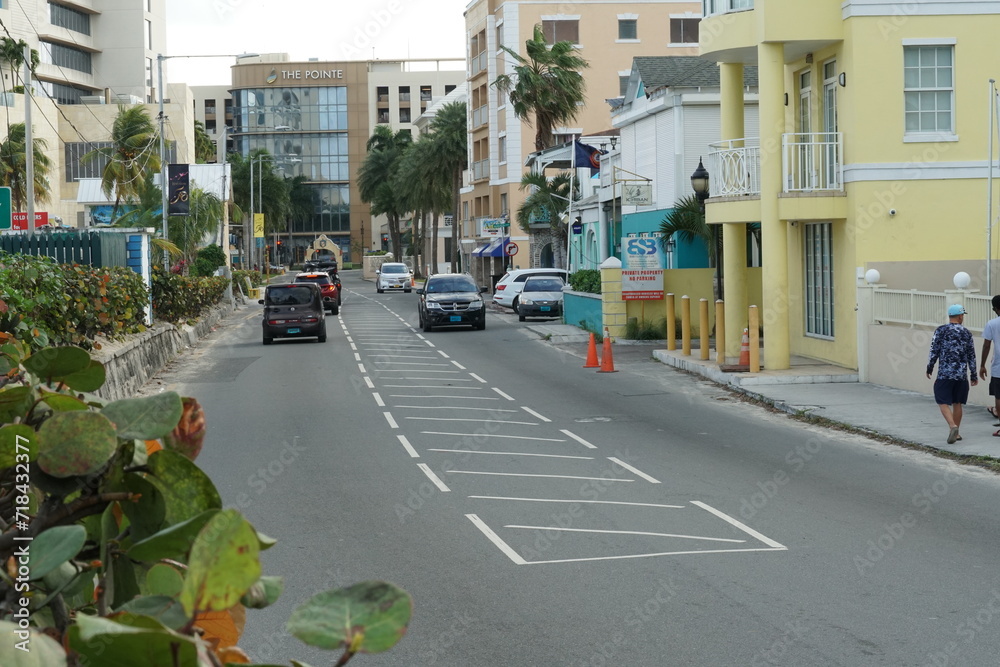 Nassau, Bahamas 12 03 2023: Street with walking people, cars, modern ...