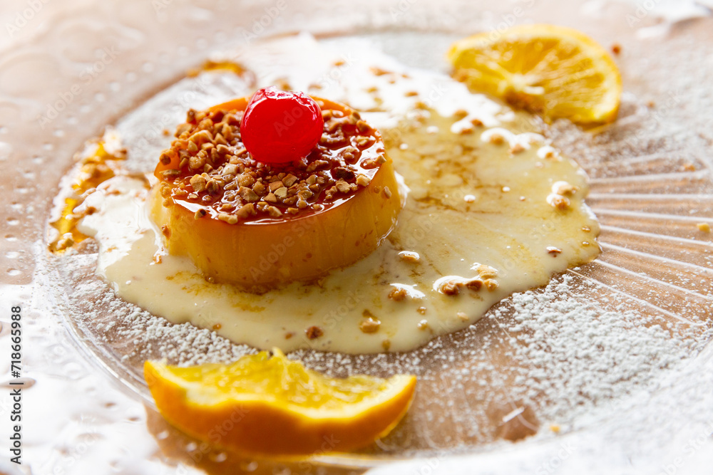 Popular Andalusian dessert tocino de cielo baked from egg yolks with sugar syrup served with ...