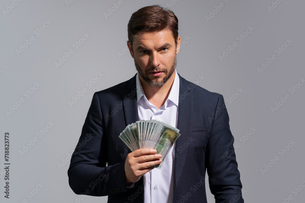 Successful business man counting money. Handsome middle age man holding ...