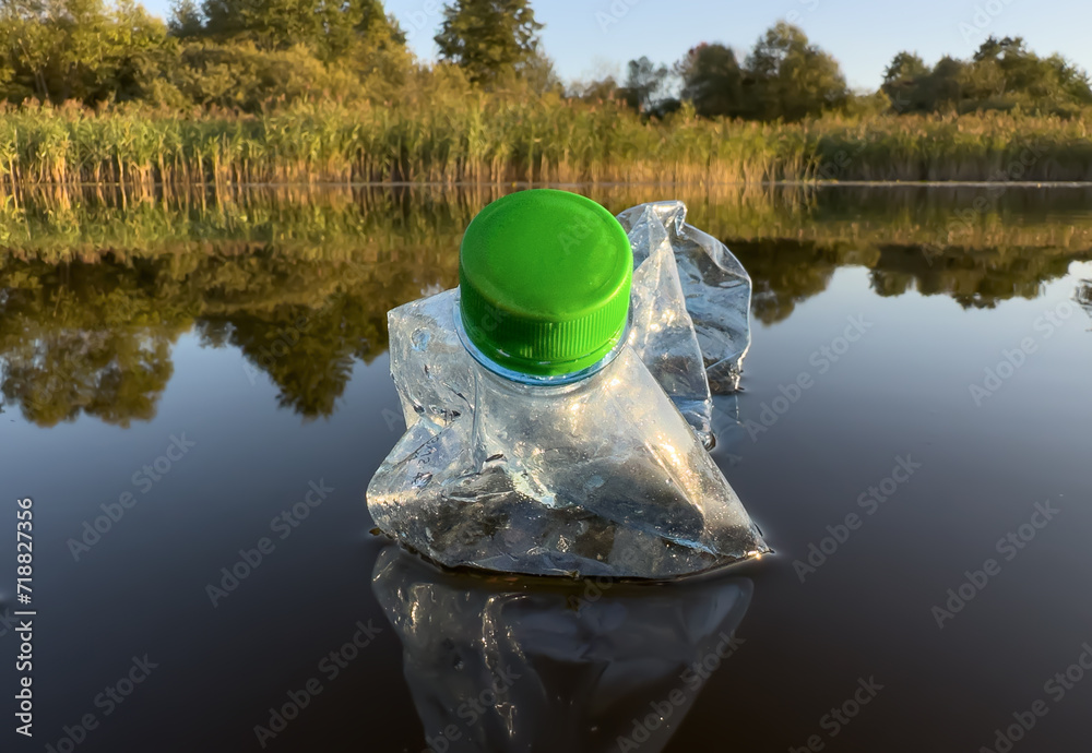 Marine plastic pollution. Plastic waste in lake. Microplastics ...