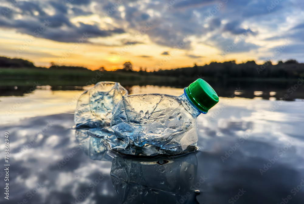 Marine plastic pollution. Plastic waste in lake. Microplastics ...