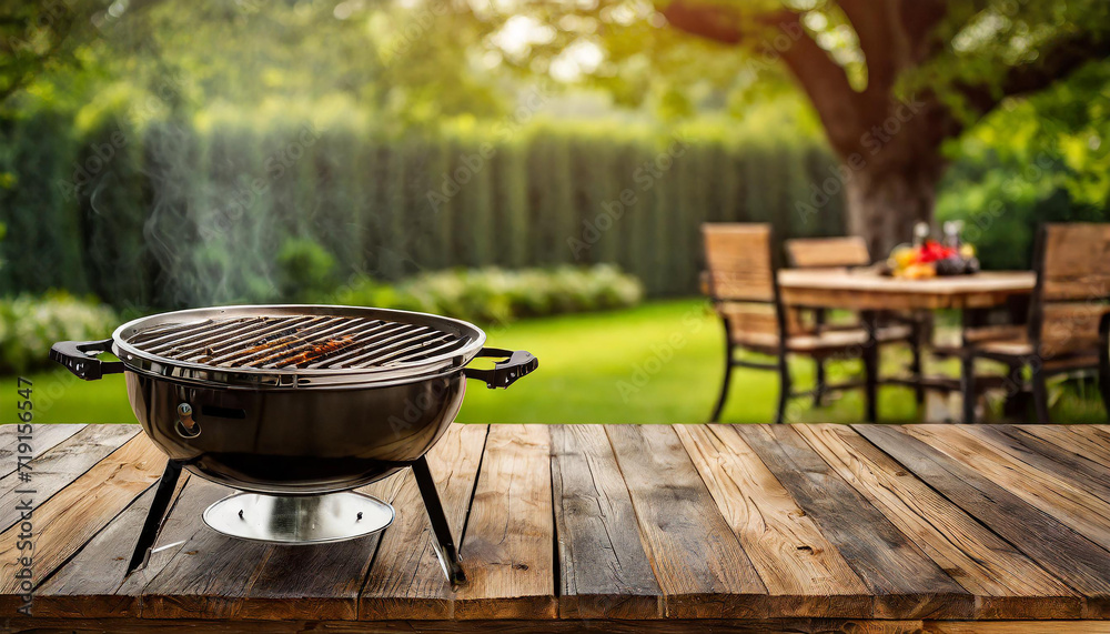BBq grill in the back yard background with empty wooden table Stock ...