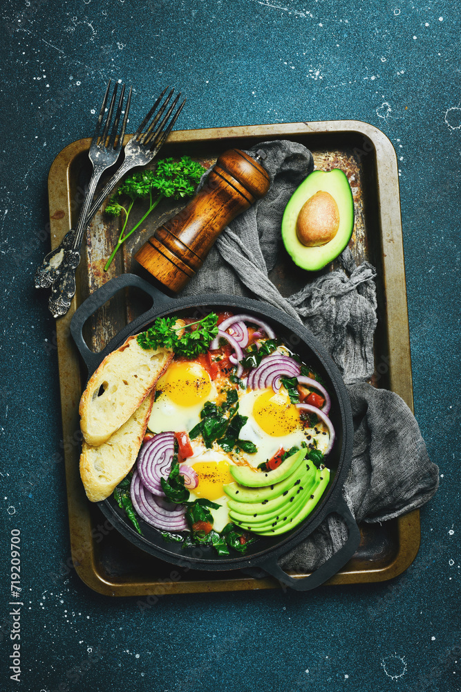 Shakshuka in a frying pan. Healthy delicious breakfast. Top view ...