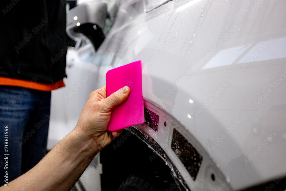 The process of installing PPF on a car. PPF is a protective film for ...