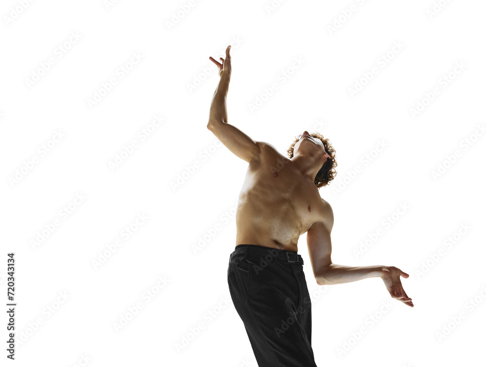 Dynamic shot shirtless male dancer with raised arms in expressive pose ...