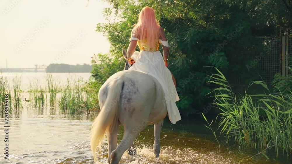 Art video real people Fantasy woman warrior queen sits astride white ...