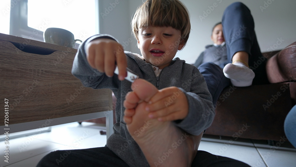 Playful Child and Mother's Pedicure Time at Home, little boy attempts ...