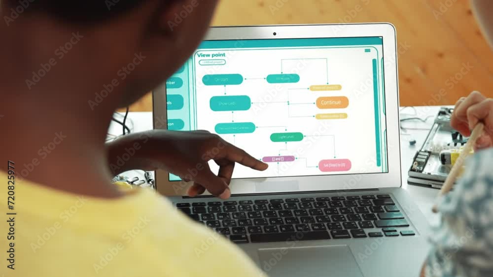 Vidéo Stock Laptop display coding system while student studying writing ... Vidéo Stock Laptop display coding system while student studying writing ...