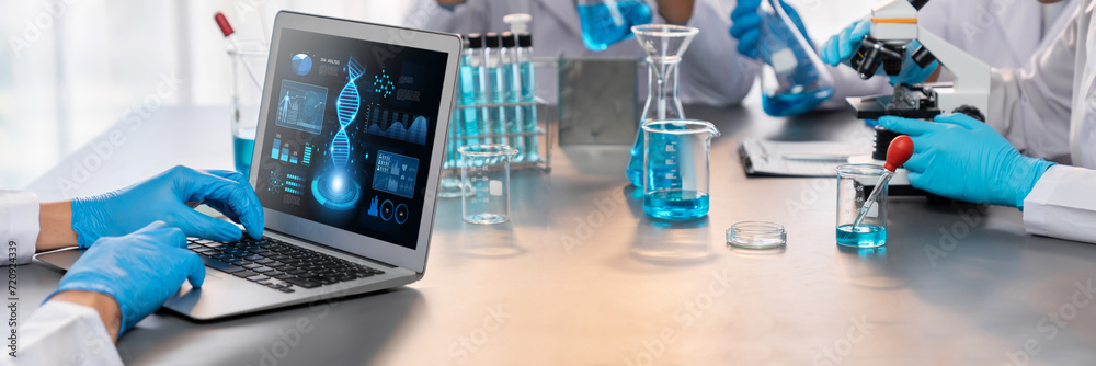 Dedicated scientist group working on advance biotechnology computer ...