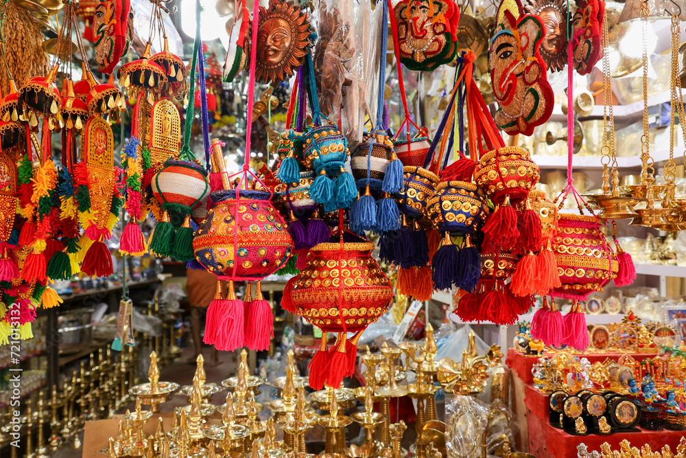 traditional dahi handi or Matka earthen pot)tied up high on the ...