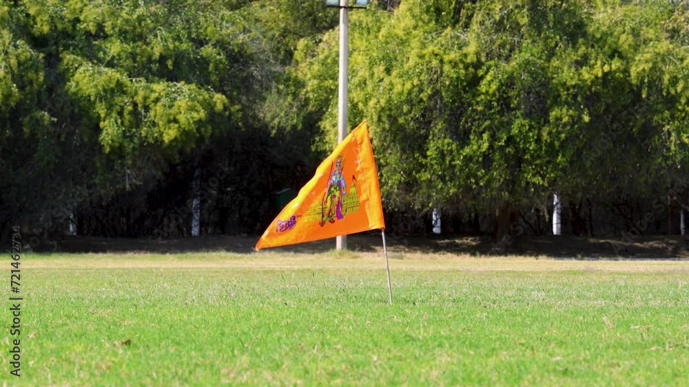 Vidéo Stock holy saffron flag with lord rama idol waving at ground with ...