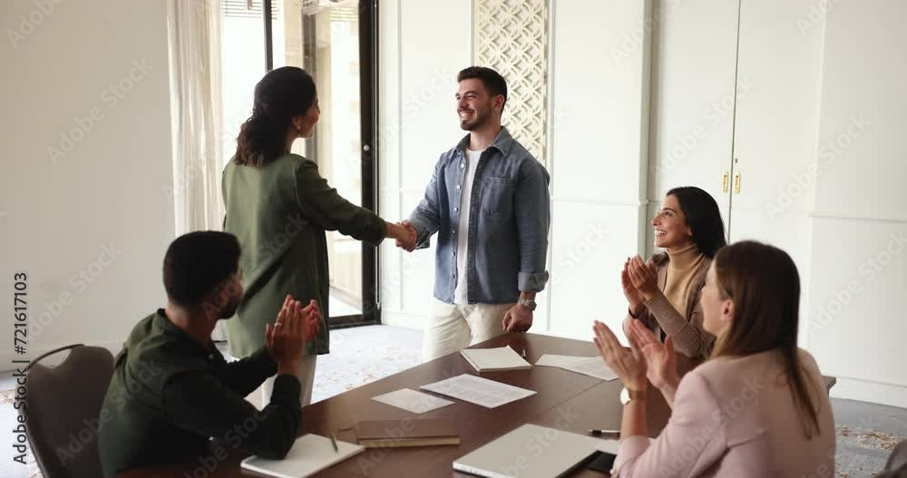 Company leader shake hands young employee, praising for work, thank for ...