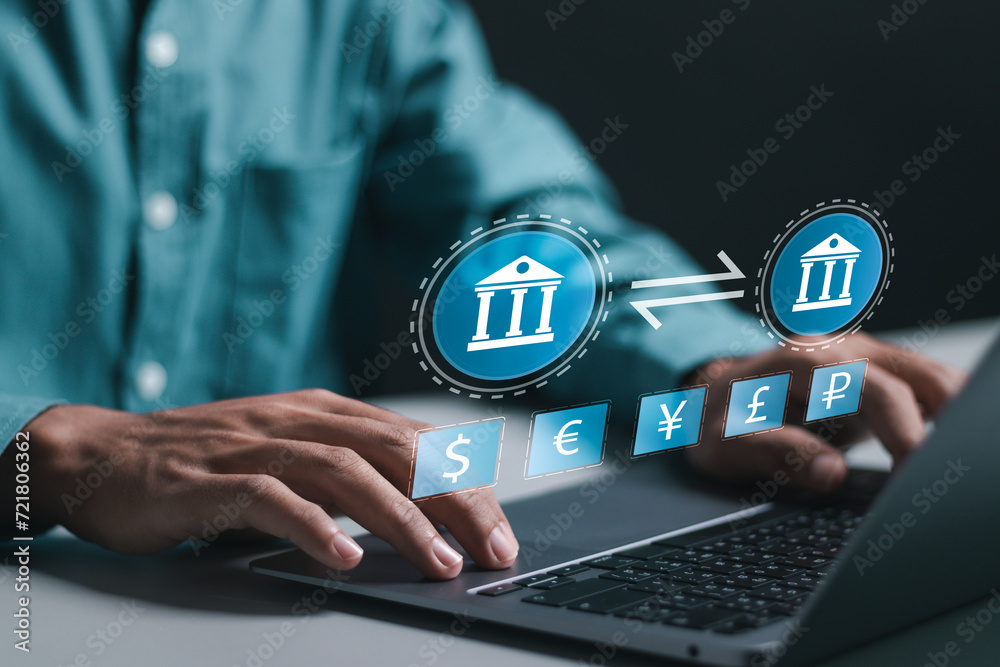 Online banking interbank payment concept. Businessman use laptop with ...