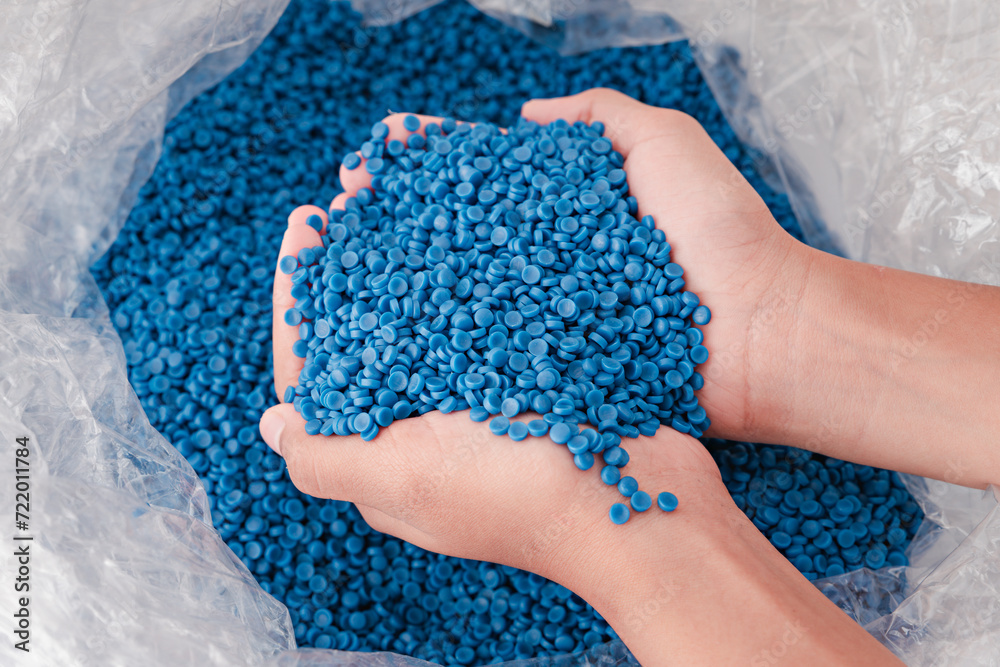 White plastic grain, plastic polymer granules,hand hold Polymer pellets ...