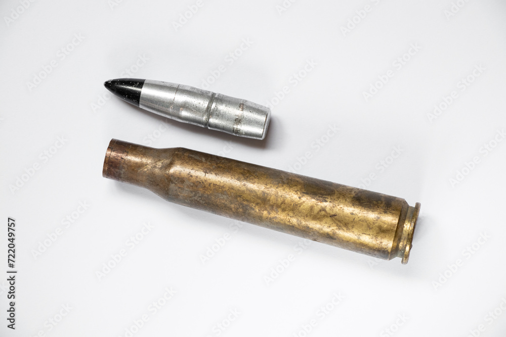 Armor-piercing bullet on a white background , weapons and cartridges ...