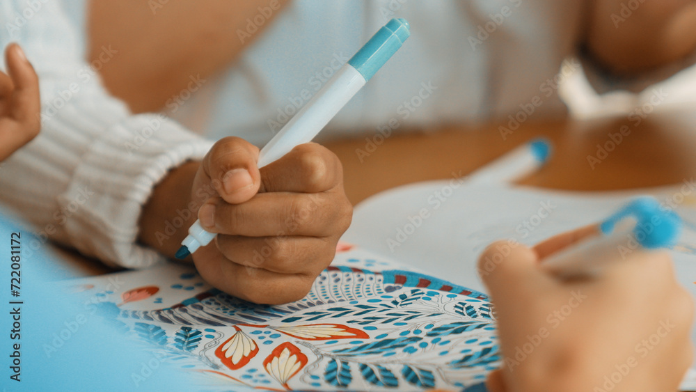 Panorama shot of diverse student hand drawing and coloring by using ...