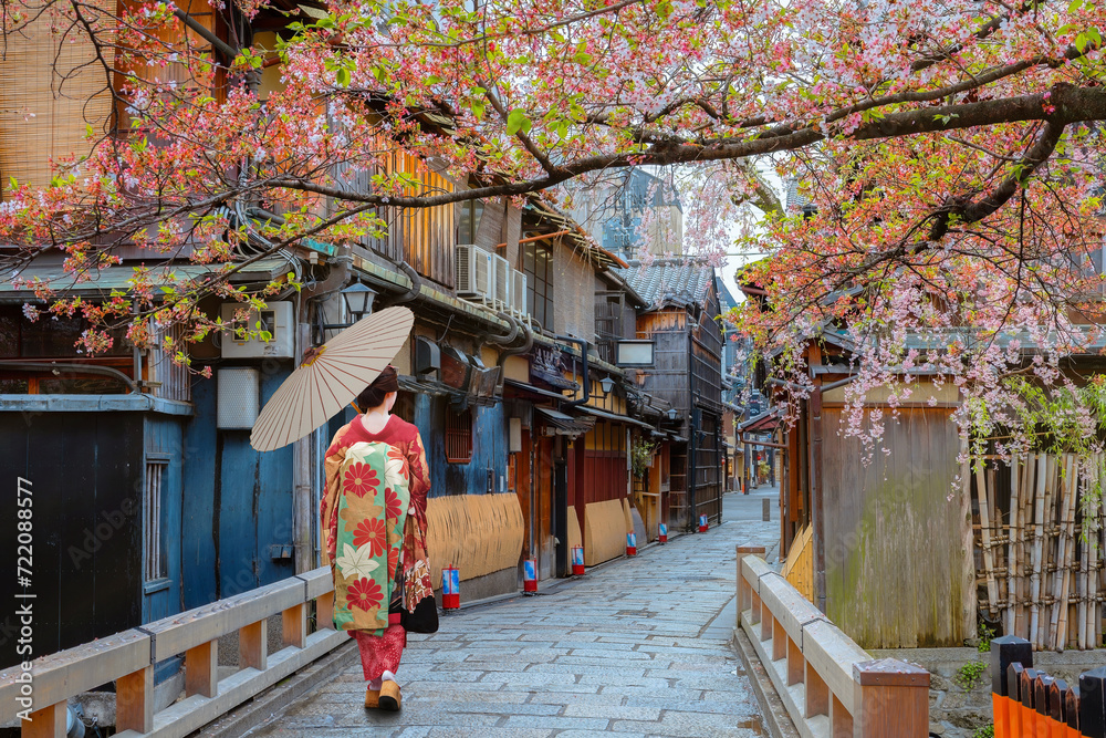 Young Japanese woman in traditional Kimono dress at Tatsumi bashi ...