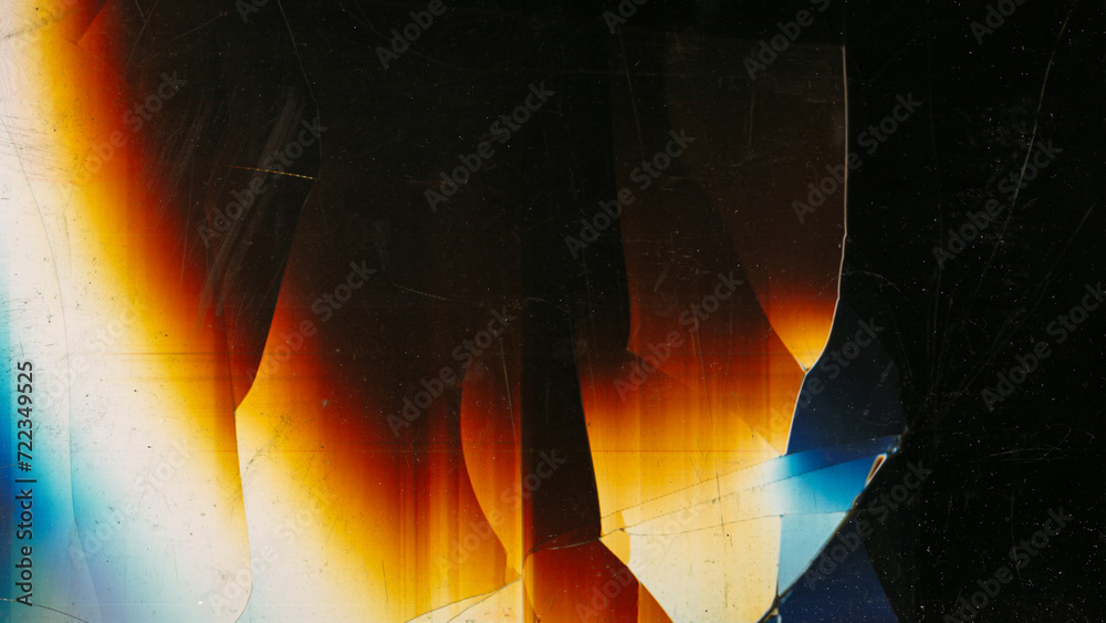 Broken screen. Cracked glass. Blue orange rainbow color glowing defect ...