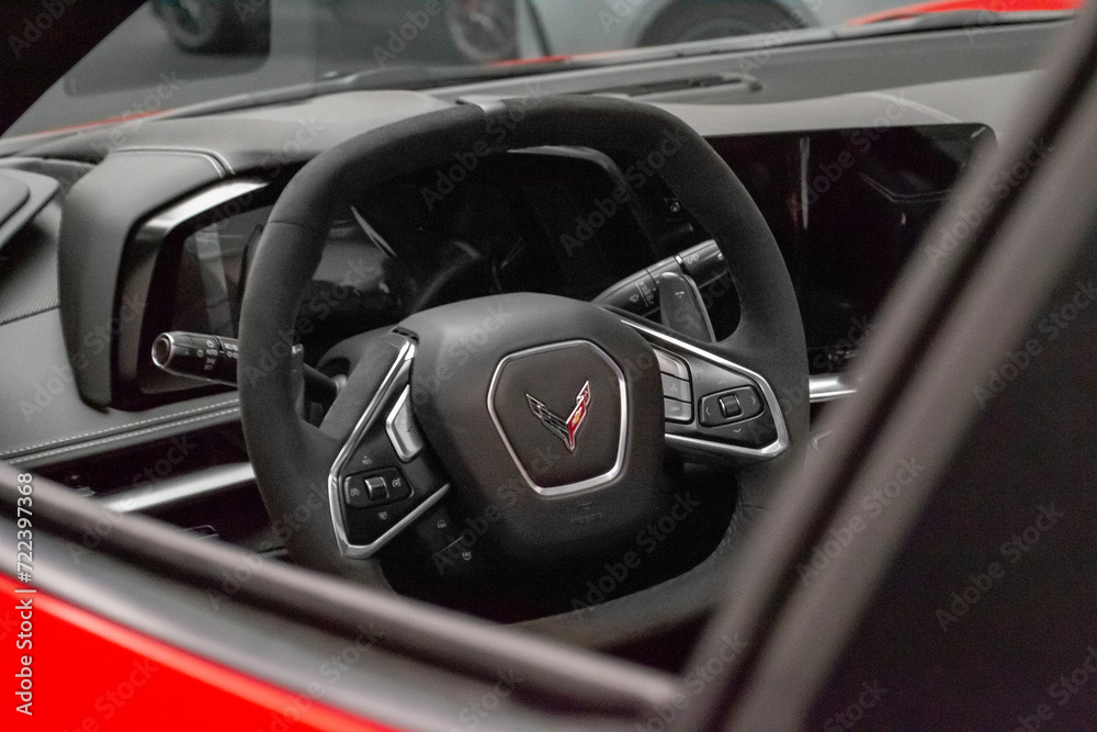 Red Chevrolet Corvette C8 Targa steering wheel focused shot Stock Photo ...