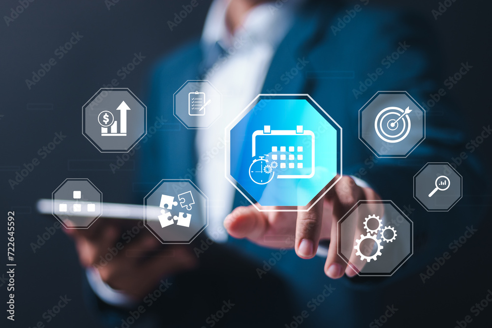 Time management concept. Businessman touch virtual time management icon ...