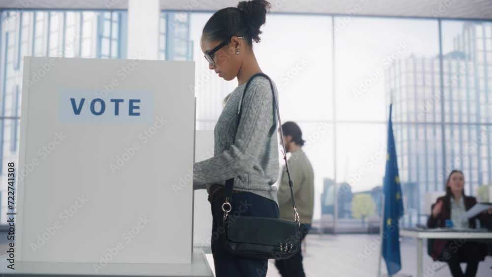 Young Stylish African Female Casting Her Vote at a Polling Station ...