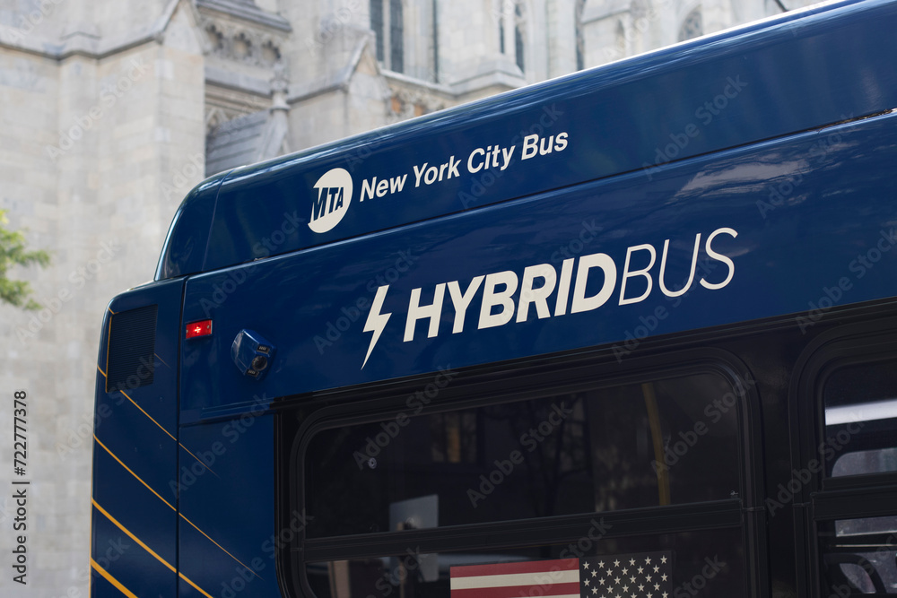 New York, NY, USA - July 5, 2022: Hybrid Bus sign is seen on a New York ...