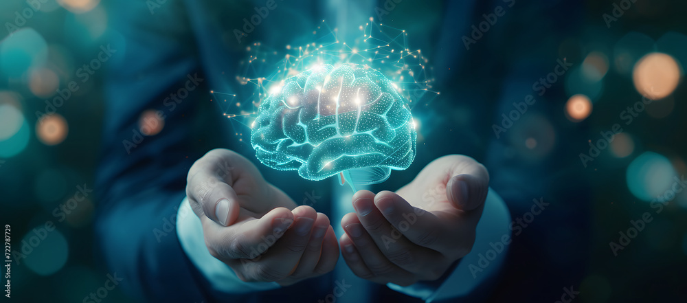 A businessman's hand holding a brain icon represents futuristic ...