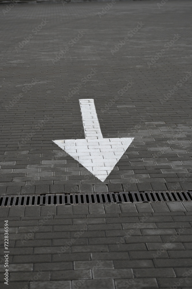 white arrow on gray asphalt, turn left, turn right, abstract white ...