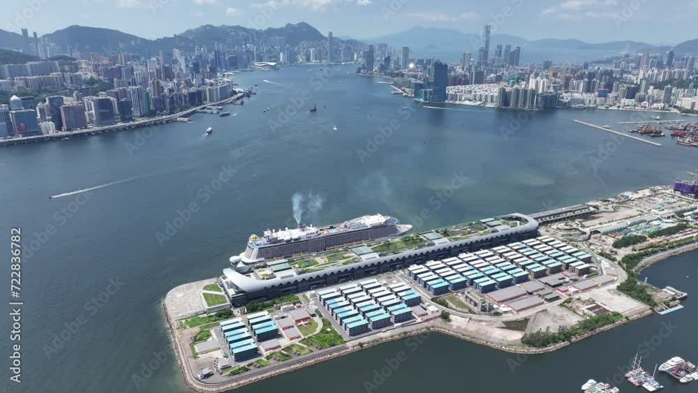 Drone Aerial Skyview of a Mega Luxury Cruise Ship is docking at the Kai ...