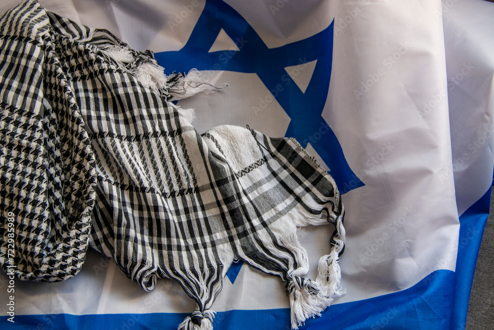 Israel flag and Palestinian scarf together lying on a rope to dry after ...