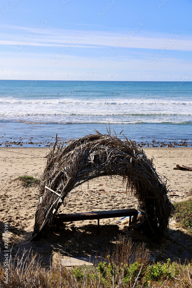 crude DIY beach shack made with palm fronds and driftwood Stock Photo ...