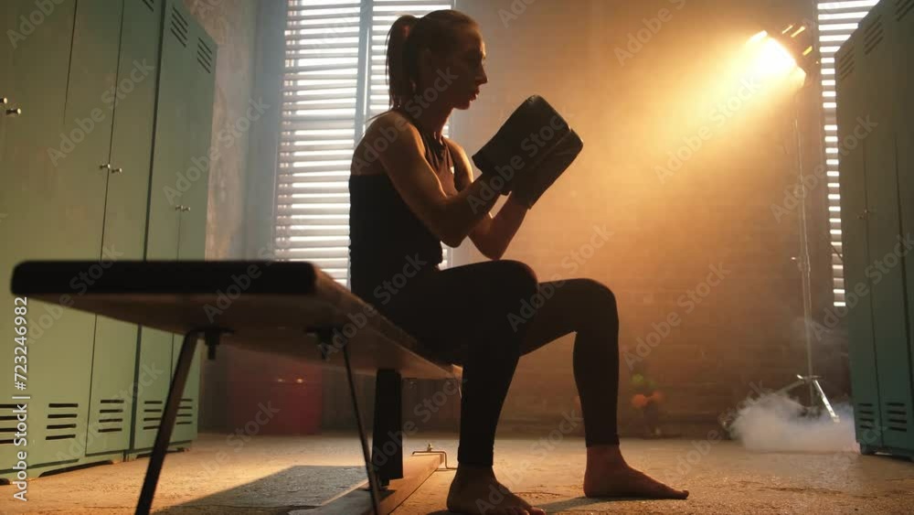 Women self defense girl power. Woman fighter preparing for fight puts ...