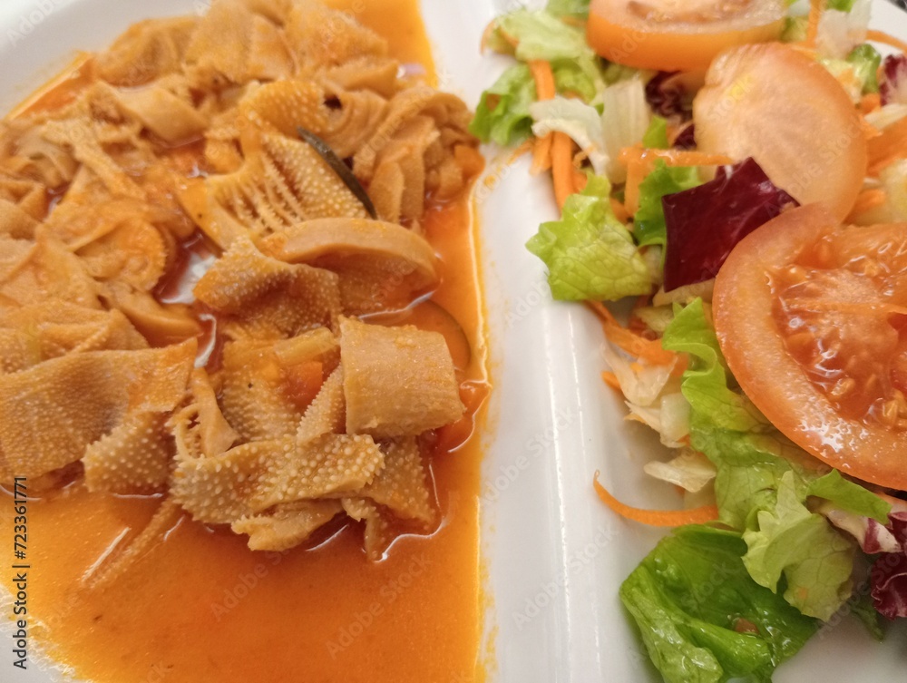typical dish of Roman cuisine, the heart of Italy, tripe, which is ...